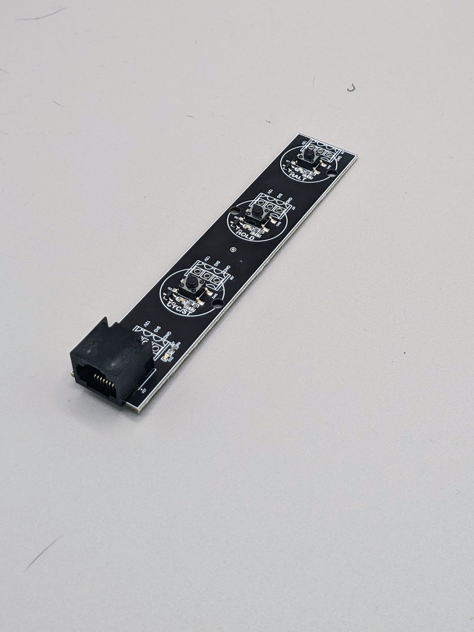 Flexi-HAL EST Button Breakout PCBA – Expatria Technologies